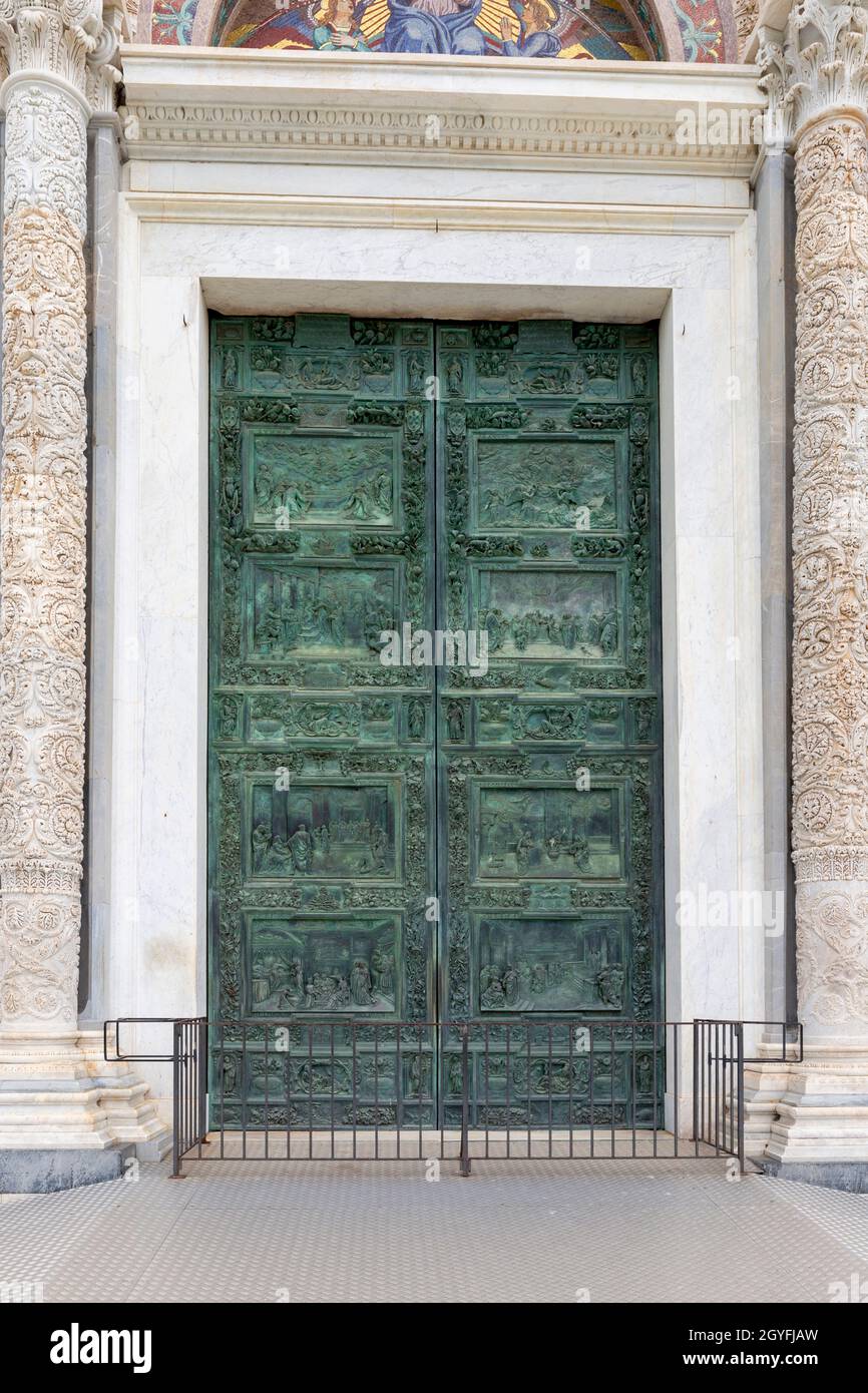 Pisa, Italy - May 13, 2019: Pisa Cathedral, great bronze door with ...