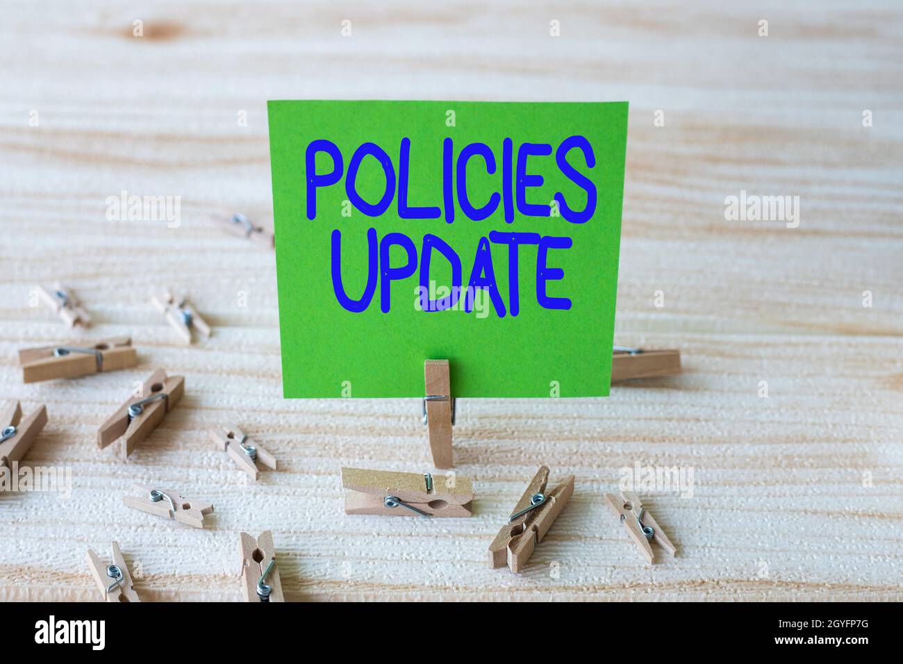 Hand Writing Sign Policies Update Internet Concept Act Of Adding New