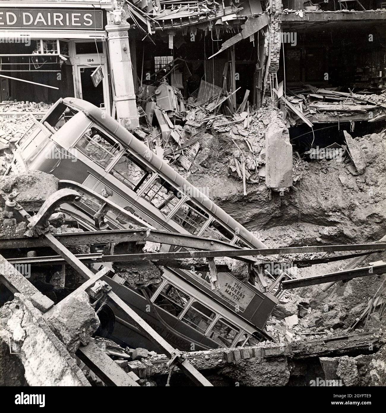 A bus in the crater above Balham underground station. The explosion ...