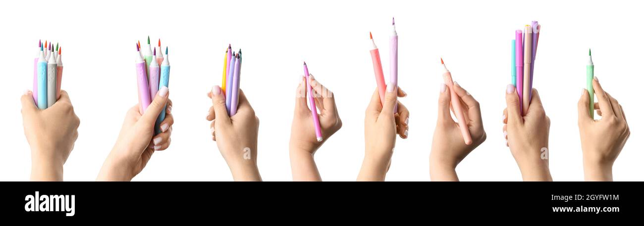 Female hands with markers on white background Stock Photo - Alamy
