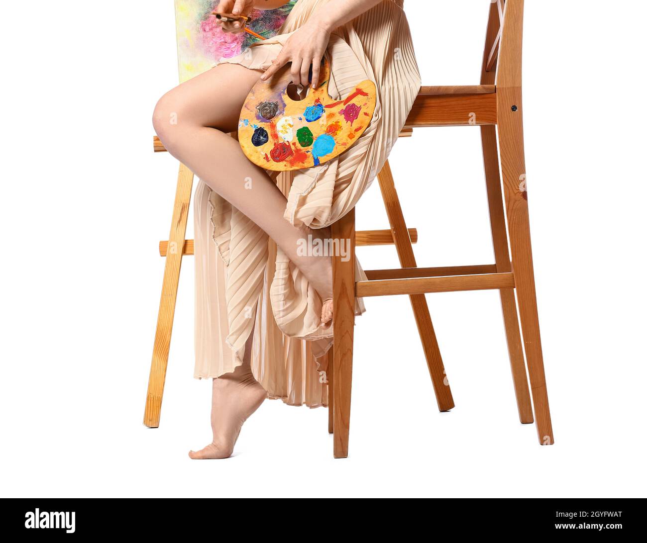 Young female artist on white background Stock Photo - Alamy