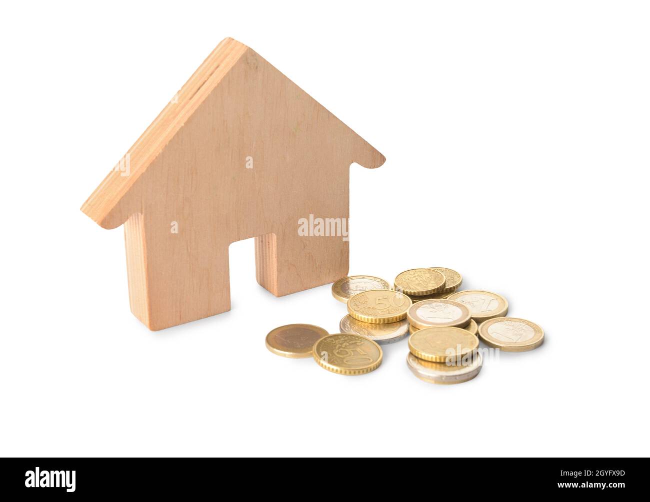 Wooden house and coins on white background Stock Photo - Alamy