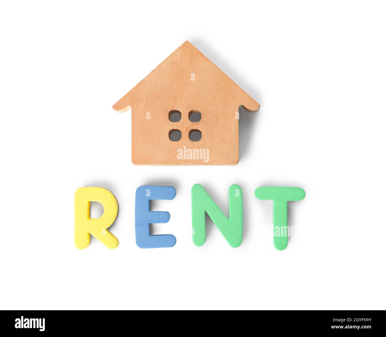 Wooden house and word RENT on white background Stock Photo - Alamy