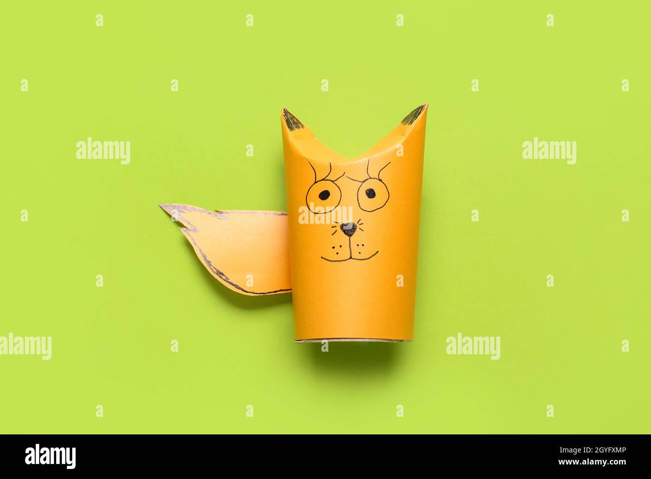 Figure of fox made of toilet paper tube on color background Stock Photo ...