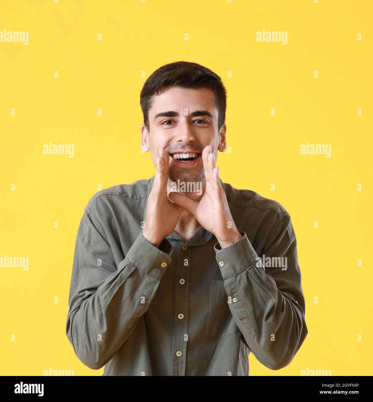 Young guy sharing secret hi-res stock photography and images - Alamy