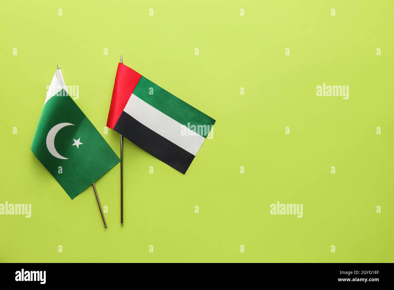 National UAE and Pakistan flags on green background Stock Photo - Alamy