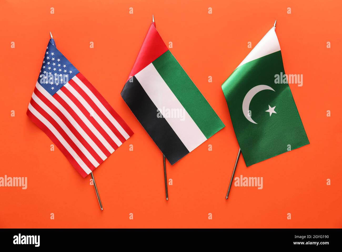 National UAE, USA and Pakistan flags on red background Stock Photo - Alamy