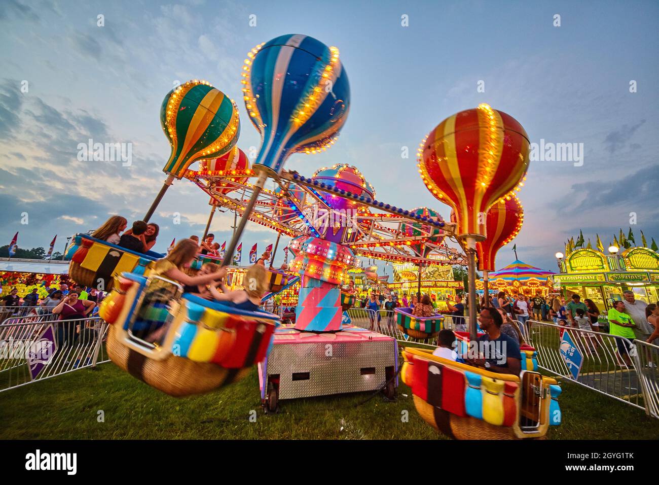 Hot air balloon carnival ride at a fair Stock Photo - Alamy