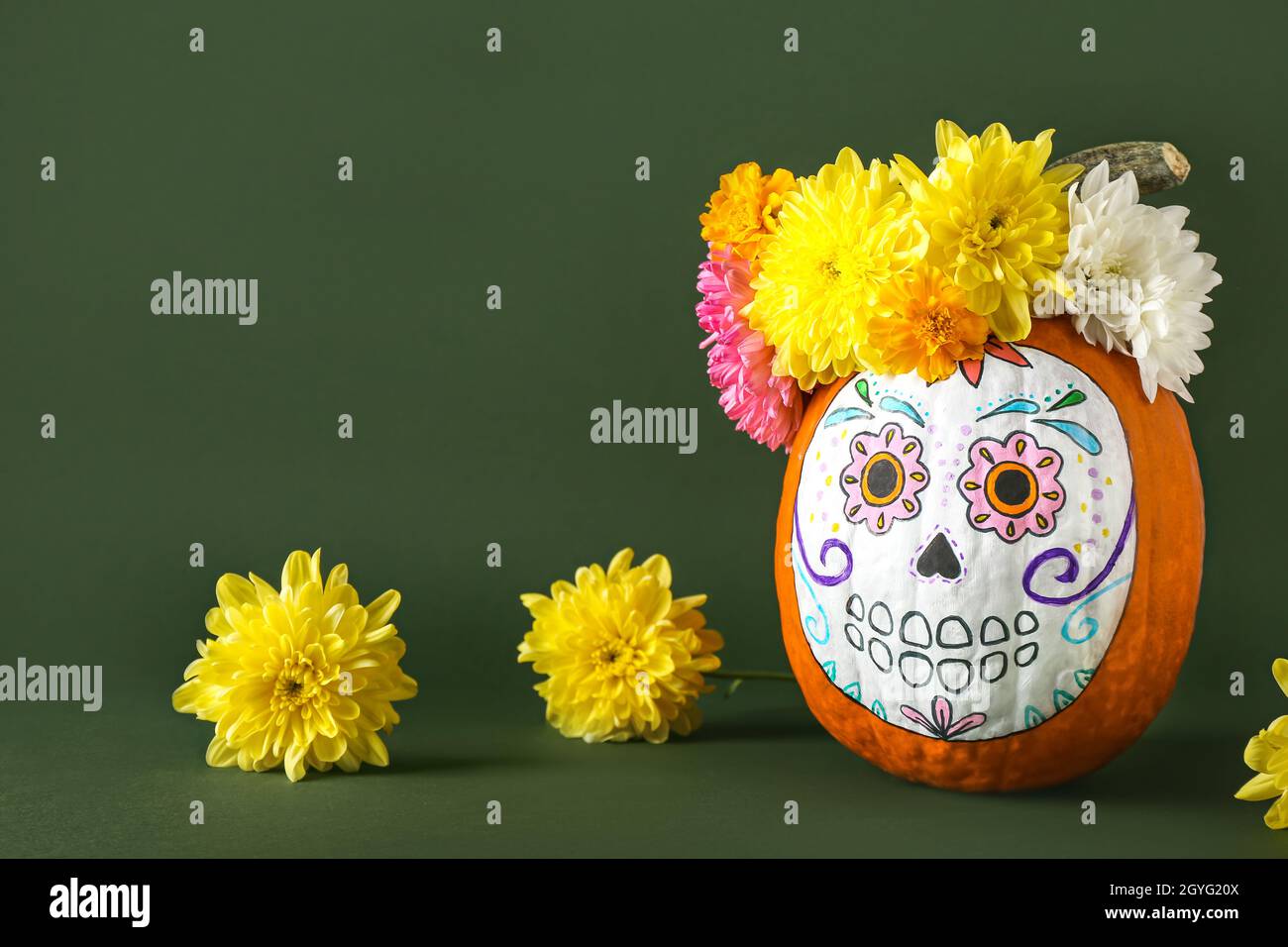 Pumpkin with painted skull on color background. Celebration of Mexico's ...