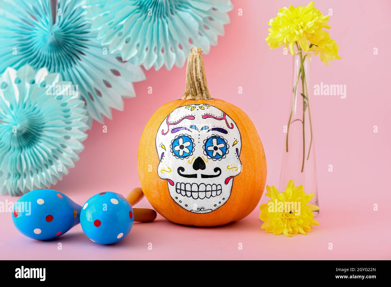 Pumpkin with painted skull on color background. Celebration of Mexico's ...