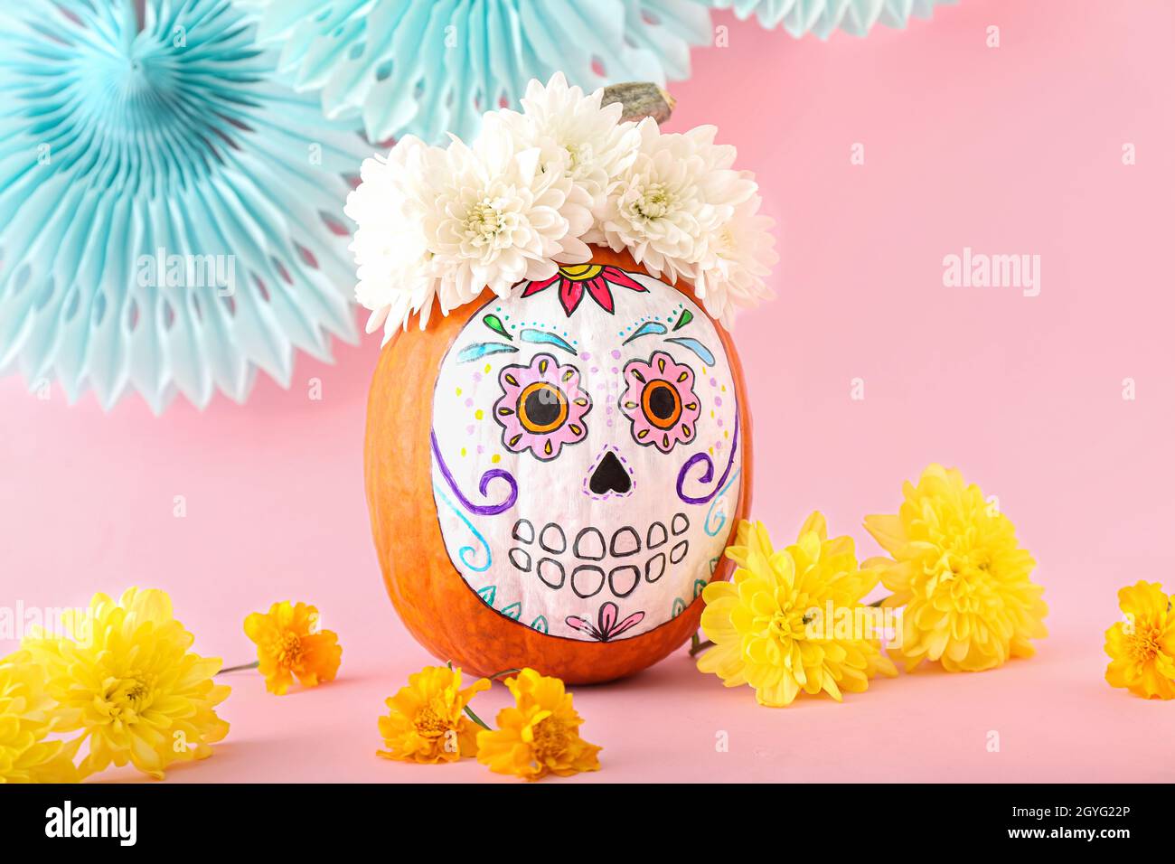 Pumpkin with painted skull on color background. Celebration of Mexico's ...