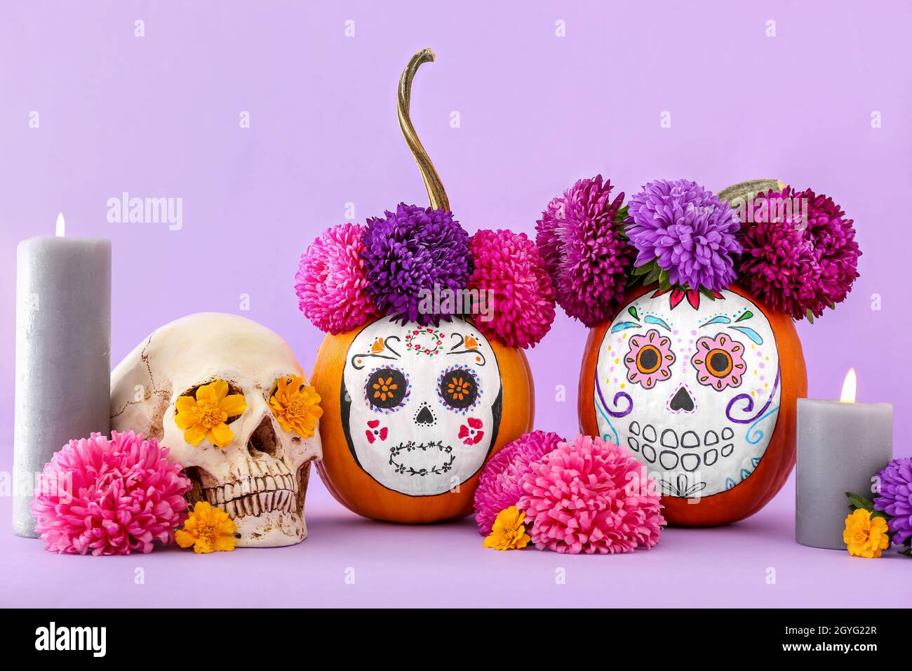 Pumpkins with painted skull on color background. Celebration of Mexico ...