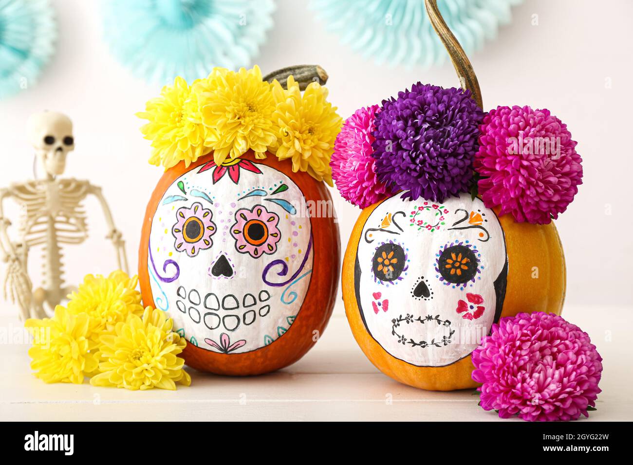 Pumpkins with painted skull on white background. Celebration of Mexico ...