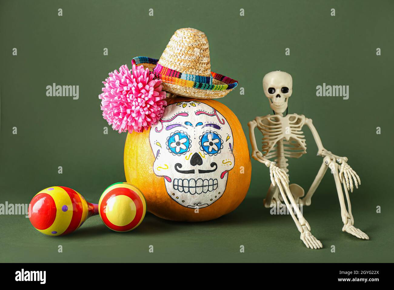 Pumpkin with painted skull on color background. Celebration of Mexico's ...