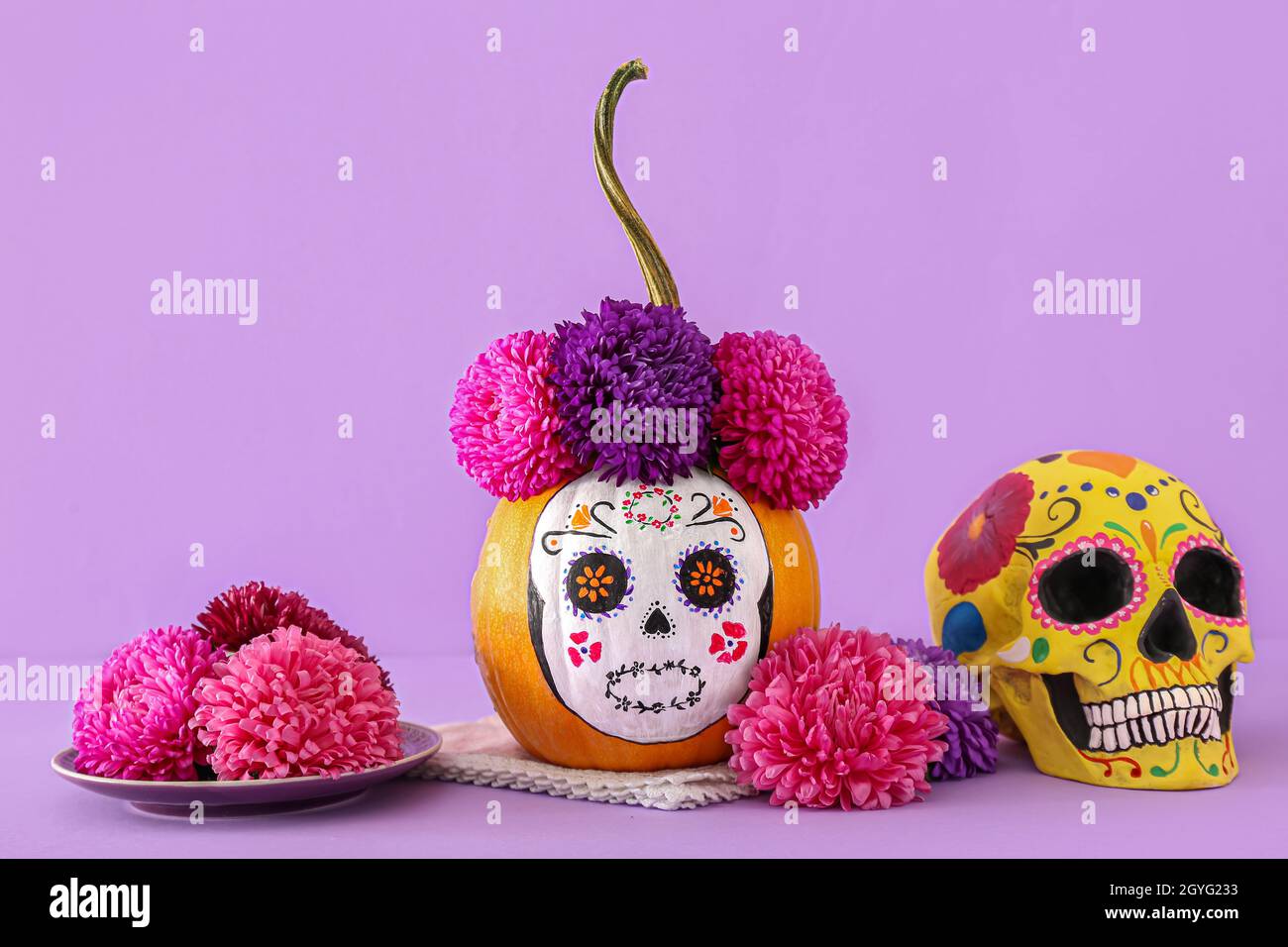 Pumpkin with painted skull on color background. Celebration of Mexico's ...
