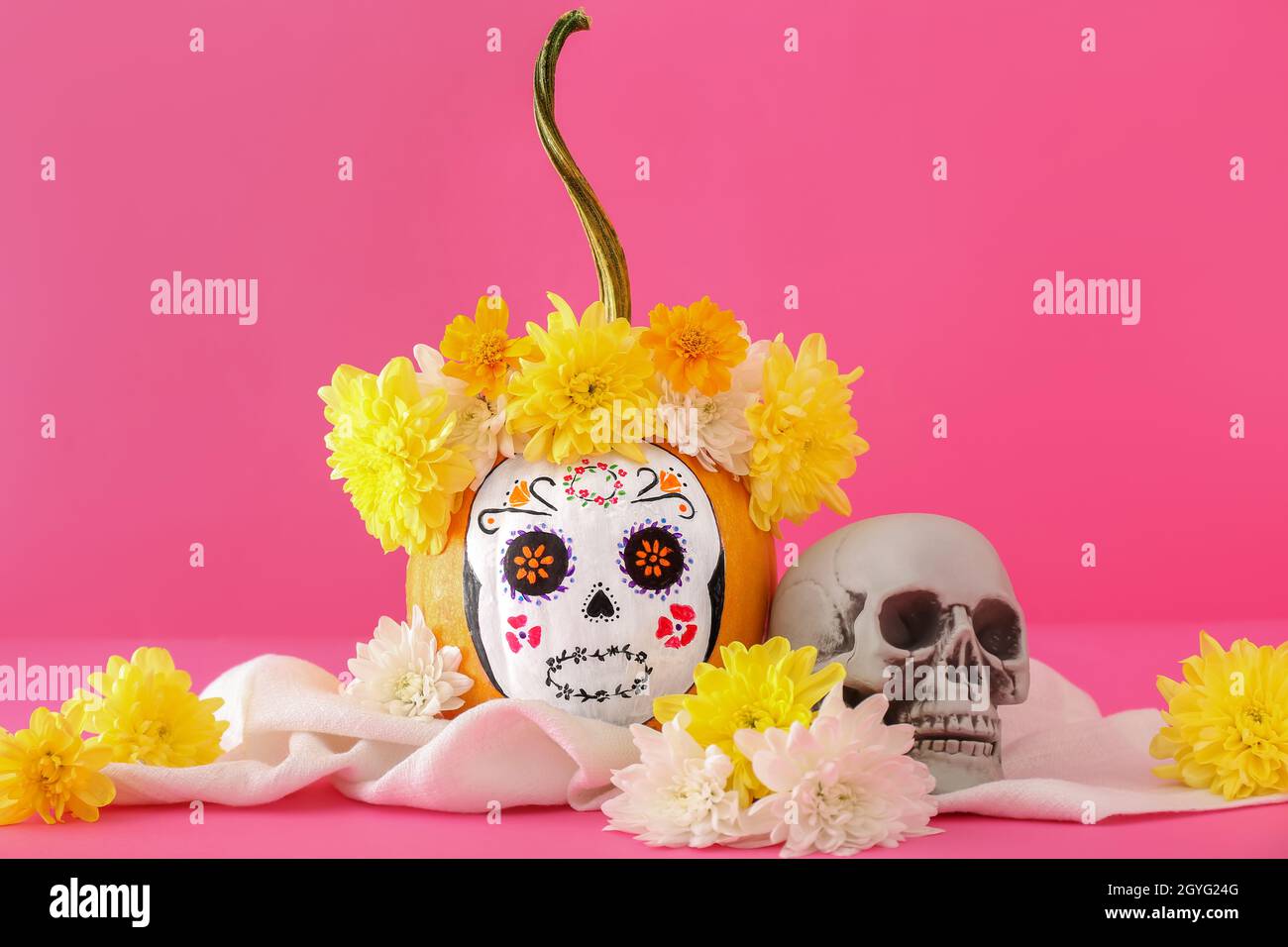 Pumpkin with painted skull on color background. Celebration of Mexico's ...