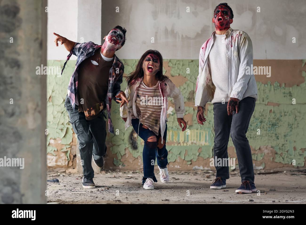 Scary zombies in ruined building Stock Photo - Alamy