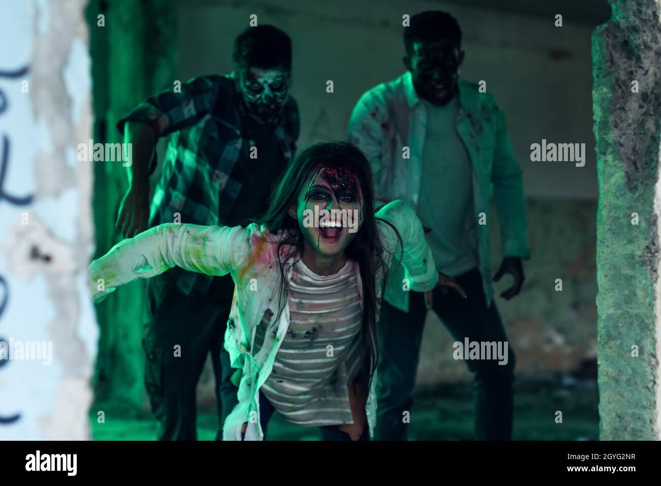 Scary zombies in ruined building Stock Photo - Alamy
