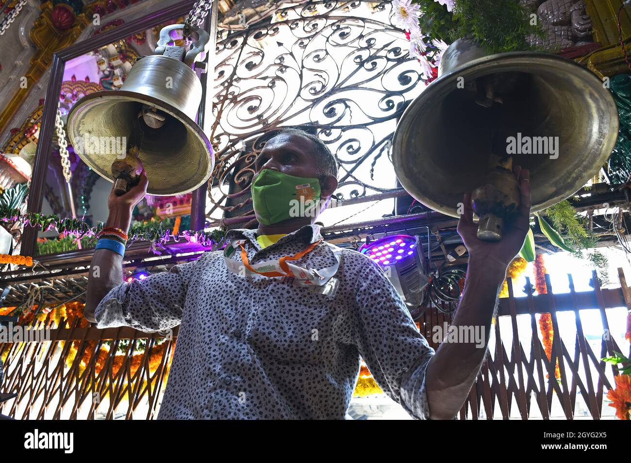 Mumbai, India. 07th Oct, 2021. A man wearing a face mask as a ...