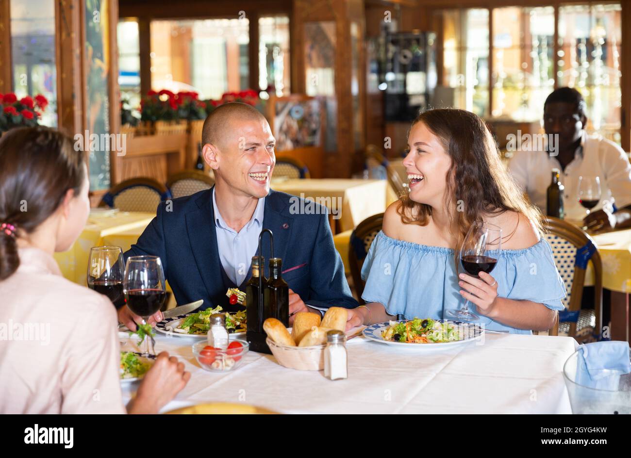 Two french people having conversation hi-res stock photography and ...