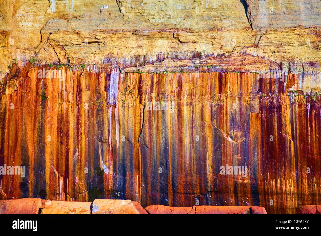 Pictured Rocks with rust colors streaking down its side Stock Photo - Alamy