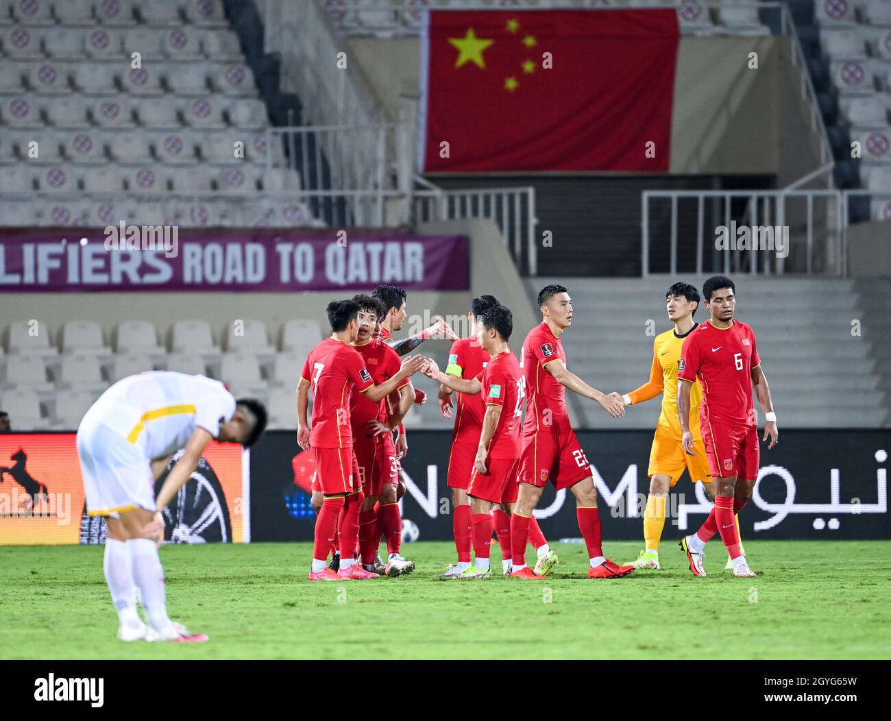 Sharjah. 8th Oct, 2021. Player of China celebrate after the FIFA World ...
