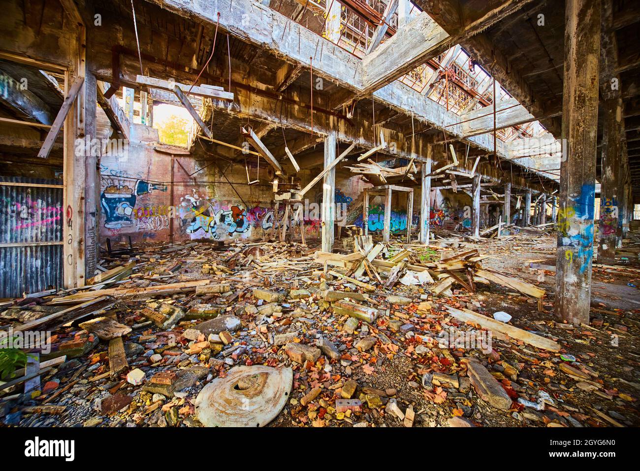 Abandoned building with caved in roof and graffiti on the walls Stock ...