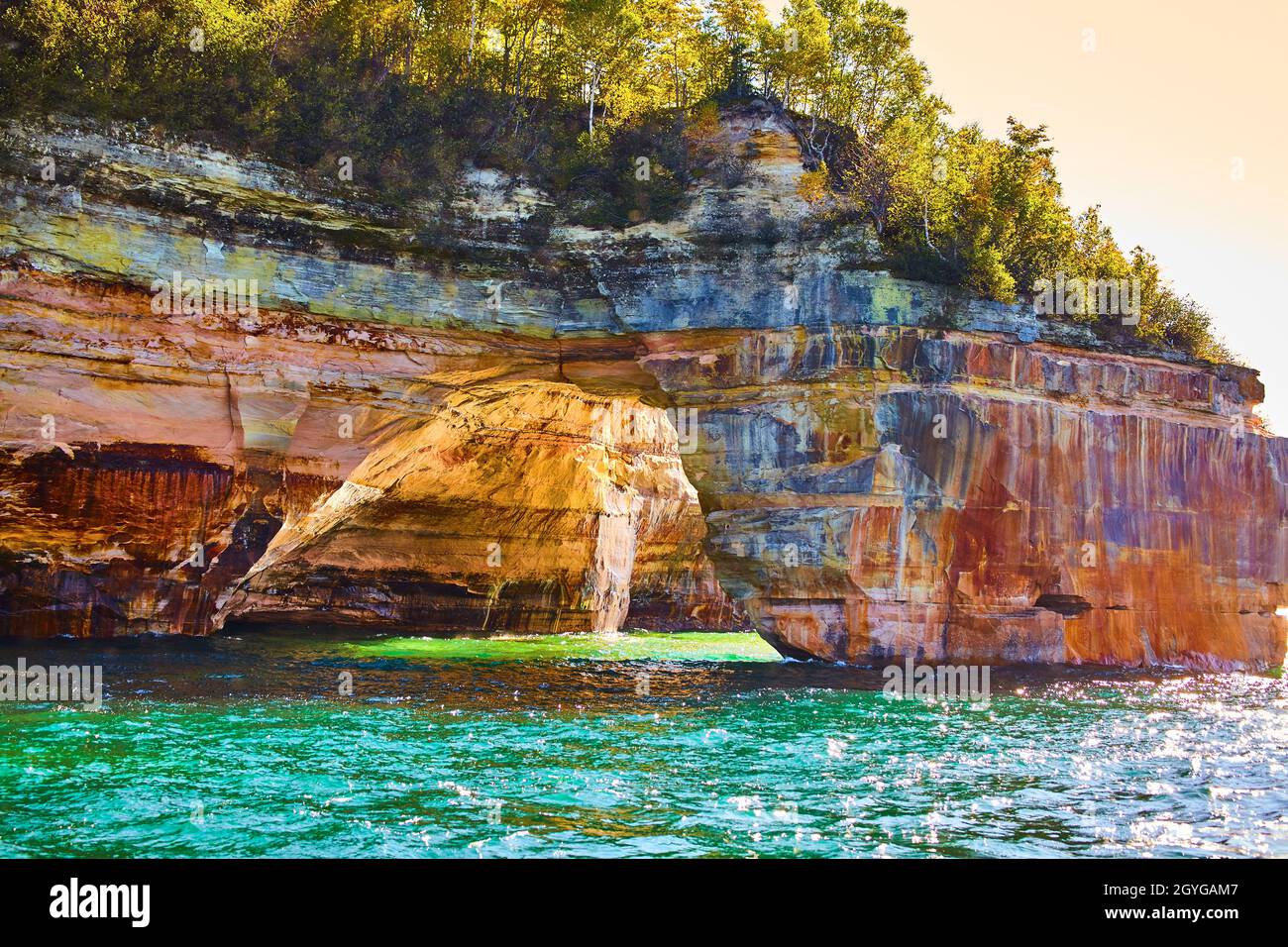 Pictured Rocks with tunnel through the cliff Stock Photo - Alamy