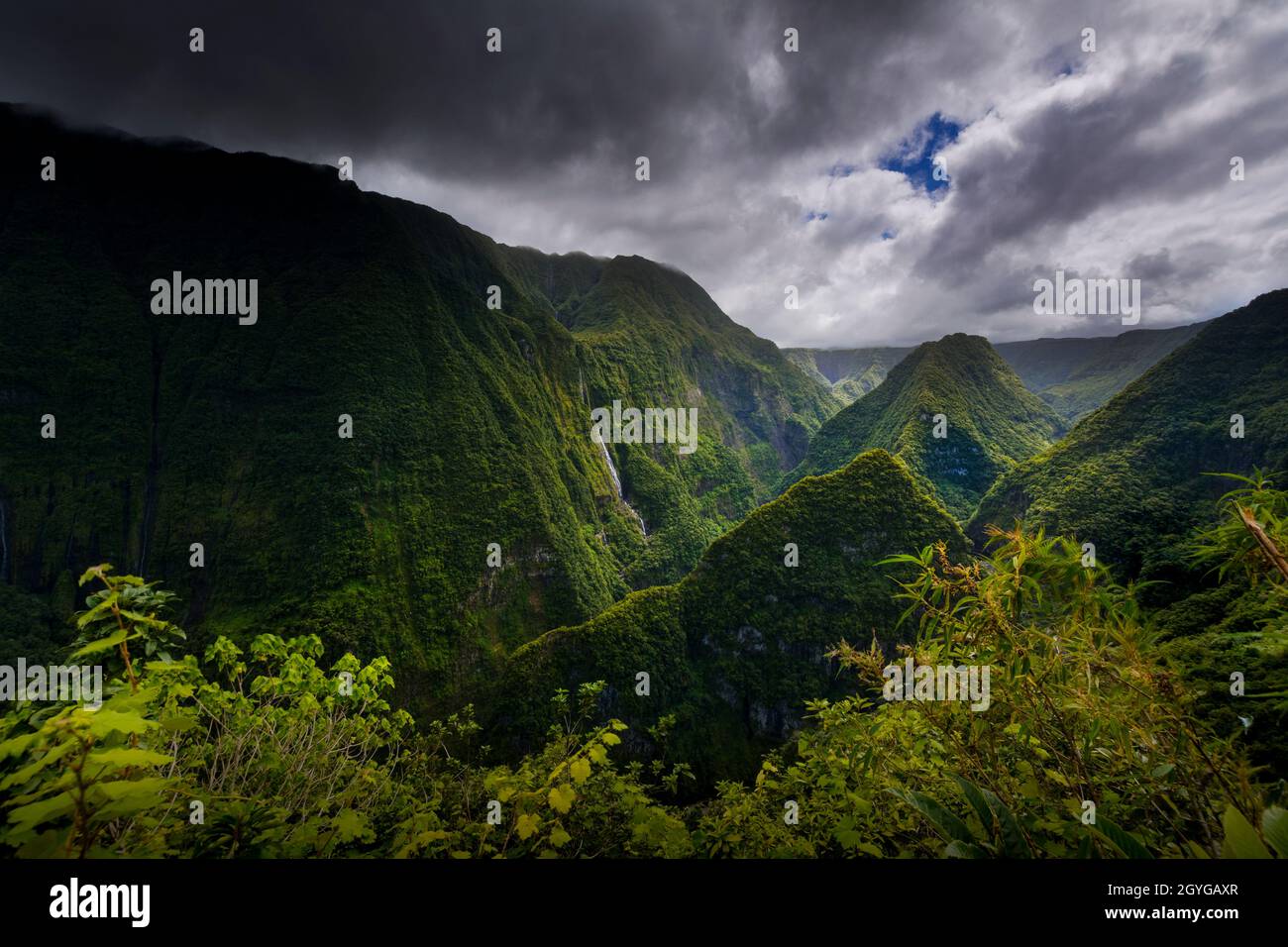 Landscape of Takamaka Valley during a cloudy day, Reunion Island Stock ...
