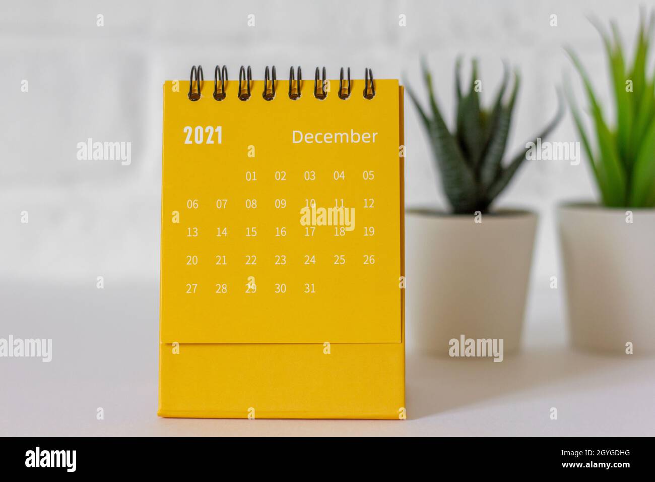 December 2021 is on the calendar.Desktop flip calendar .Hello December ...