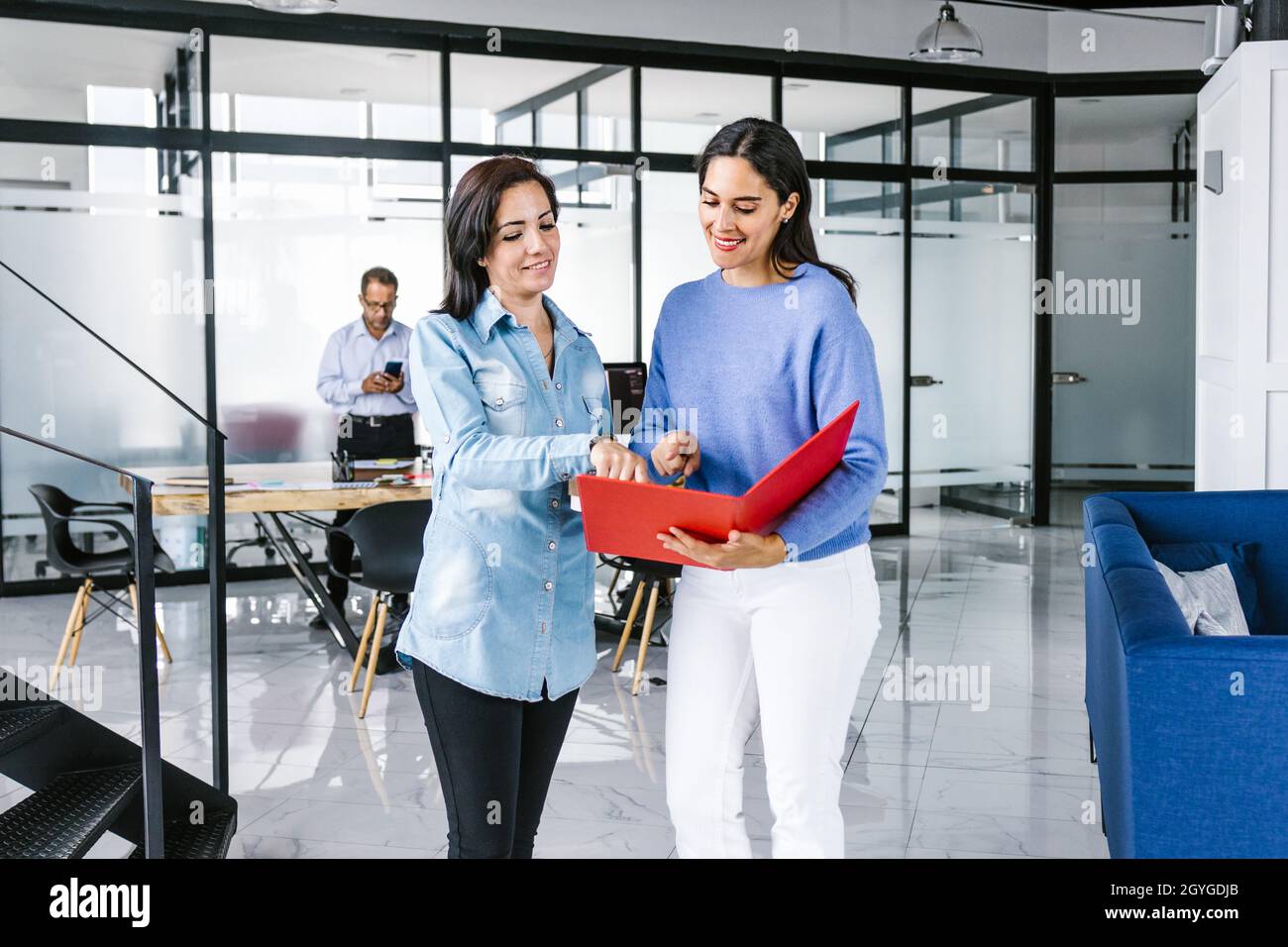 Business people reviewing documents hi-res stock photography and images ...