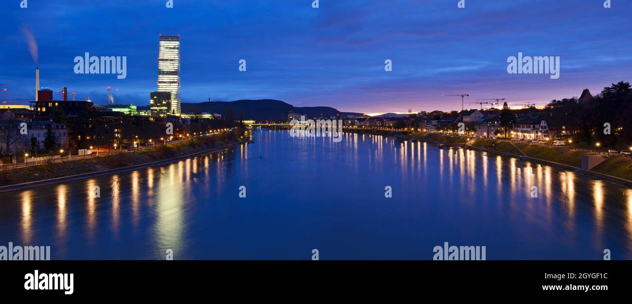 SWITZERLAND, BASEL-STADT, BASEL, THE RHINE AT NIGHT AND ROCHE TOWER ...