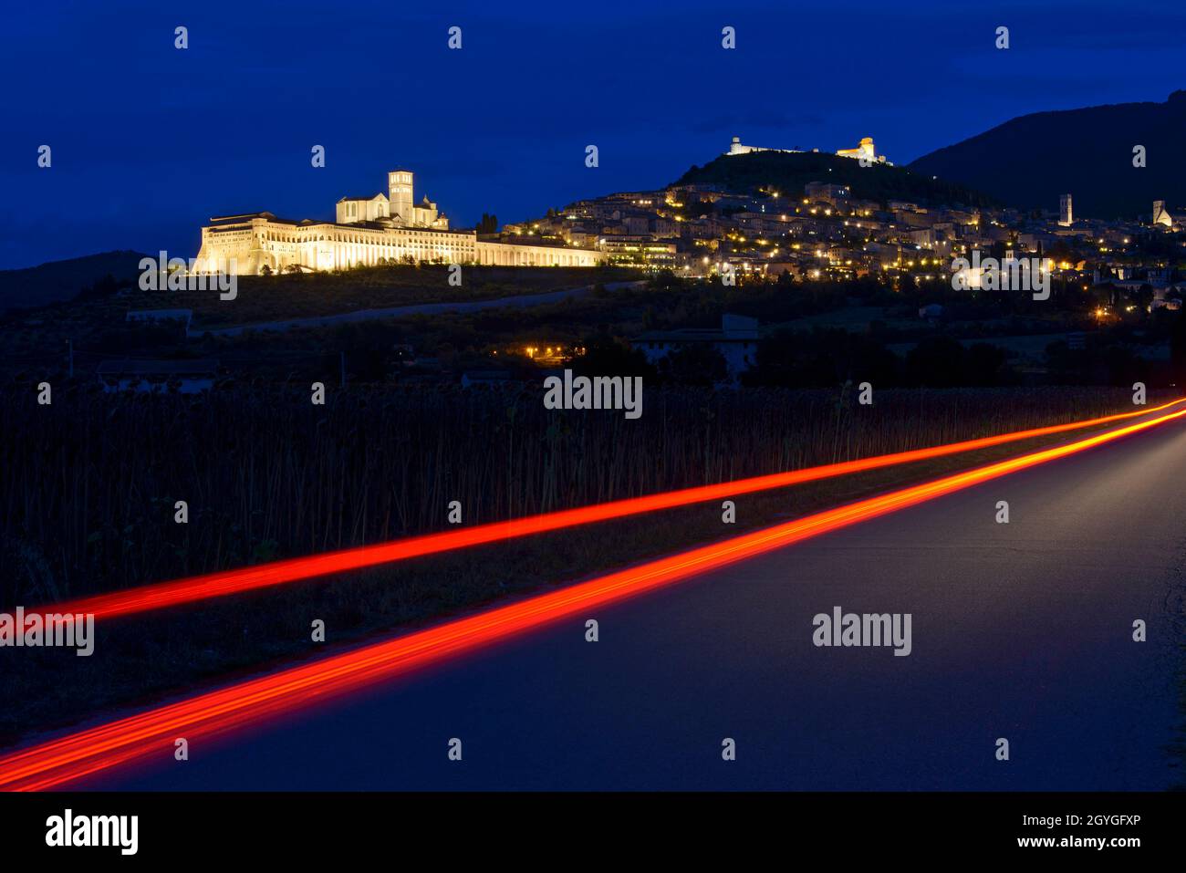 ITALY, UMBRIA, ASSISI, BASILICA OF SAINT FRANCIS OF ASSISI AT NIGHT ...