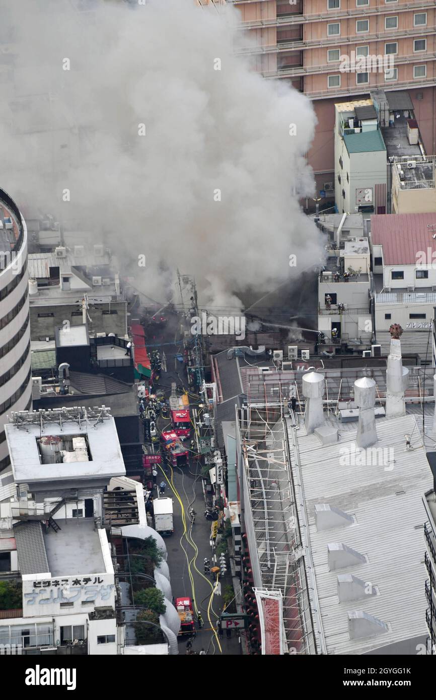 Photo taken from a Kyodo News helicopter shows smoke rising after a fire broke out on a ...