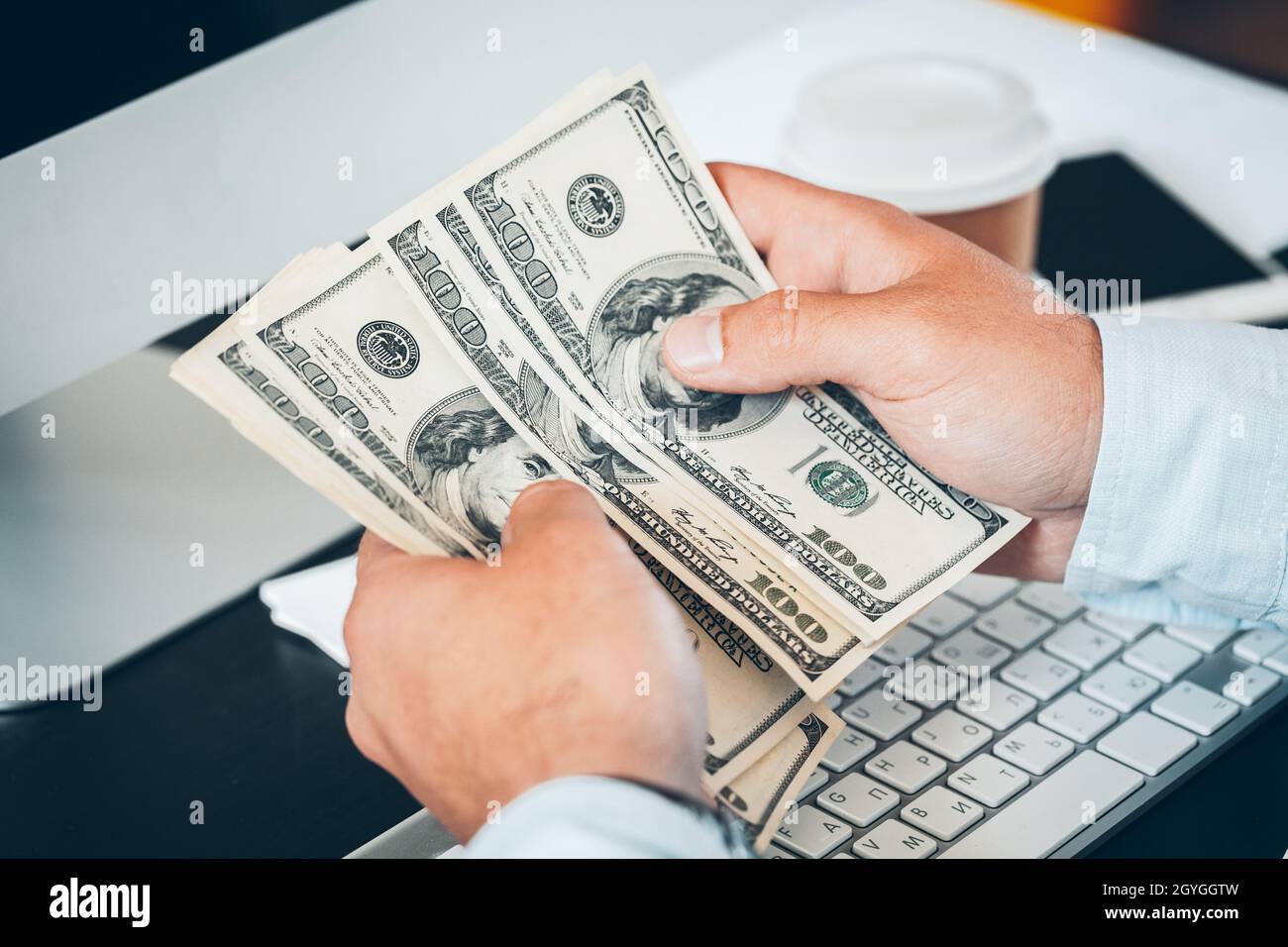 Caucasian hands counting dollar banknotes hi-res stock photography and ...