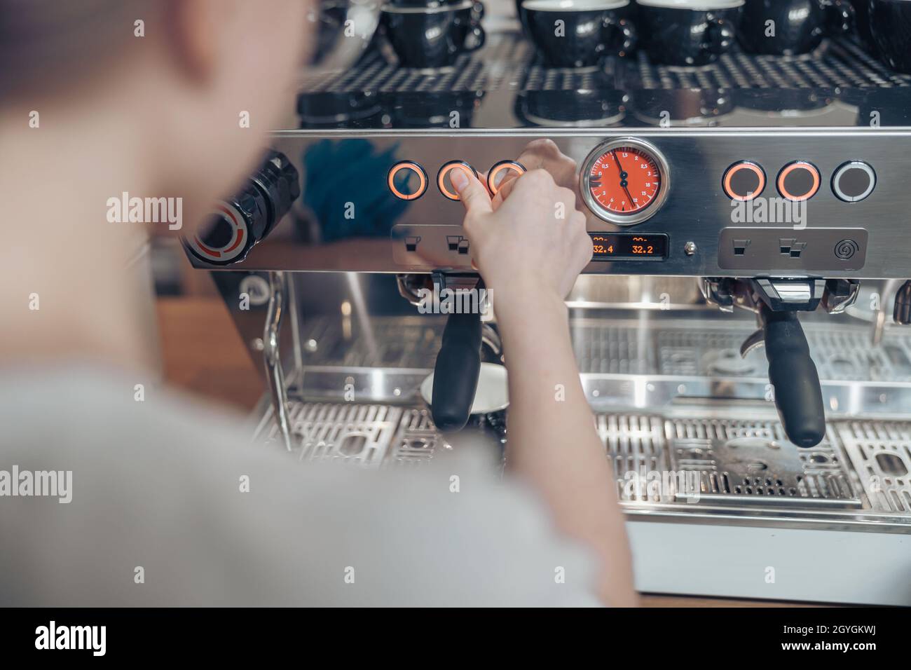 Woman coffee machine button hi-res stock photography and images - Alamy