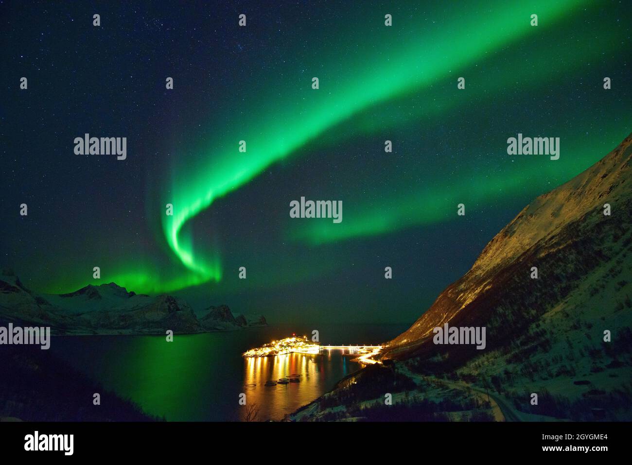 NORWAY, TROMS, SENJA, AURORA BOREALIS OVER HUSOY I SENJA Stock Photo ...