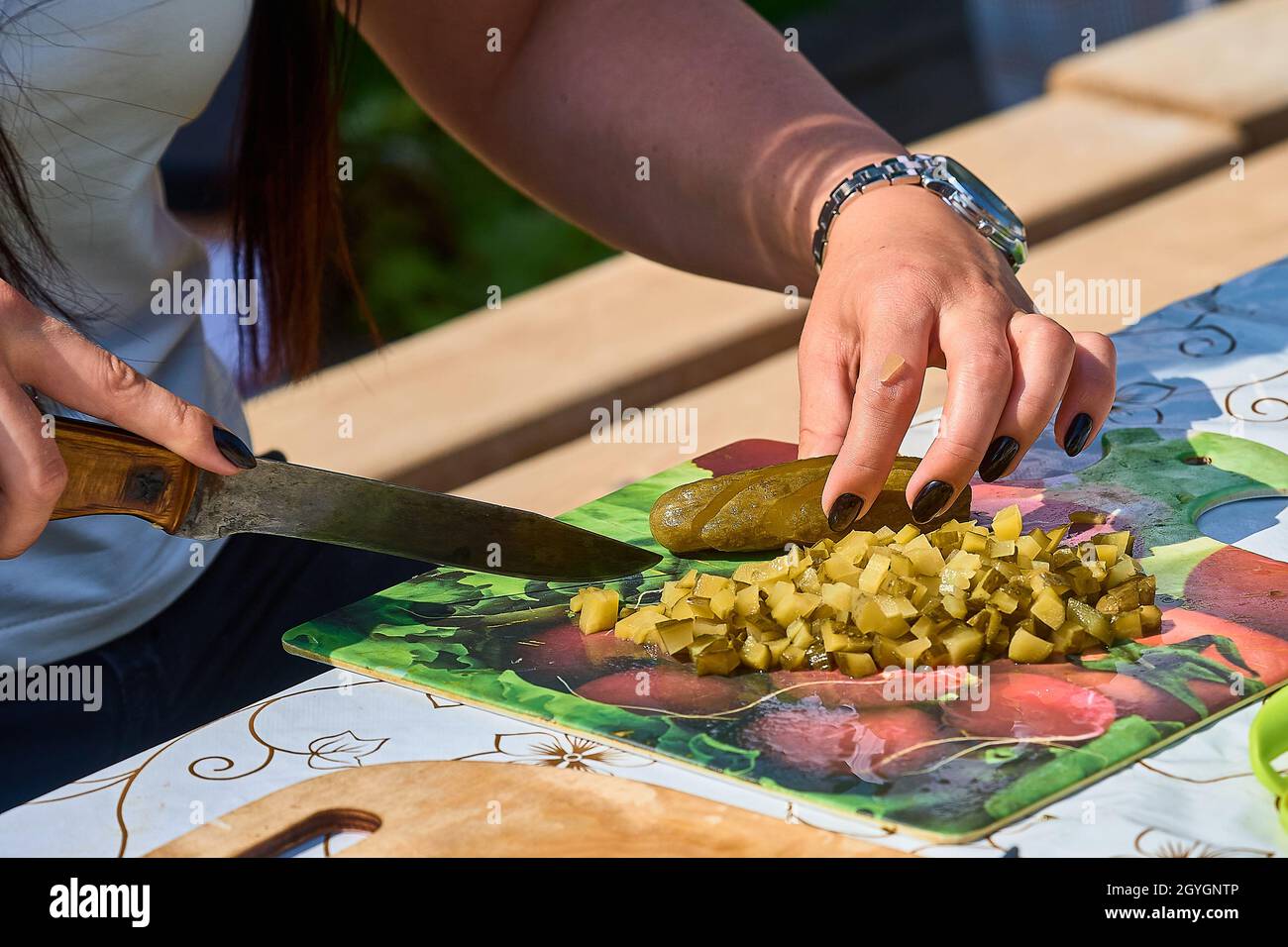 Knife cutting pickled cucumber hi-res stock photography and images - Alamy
