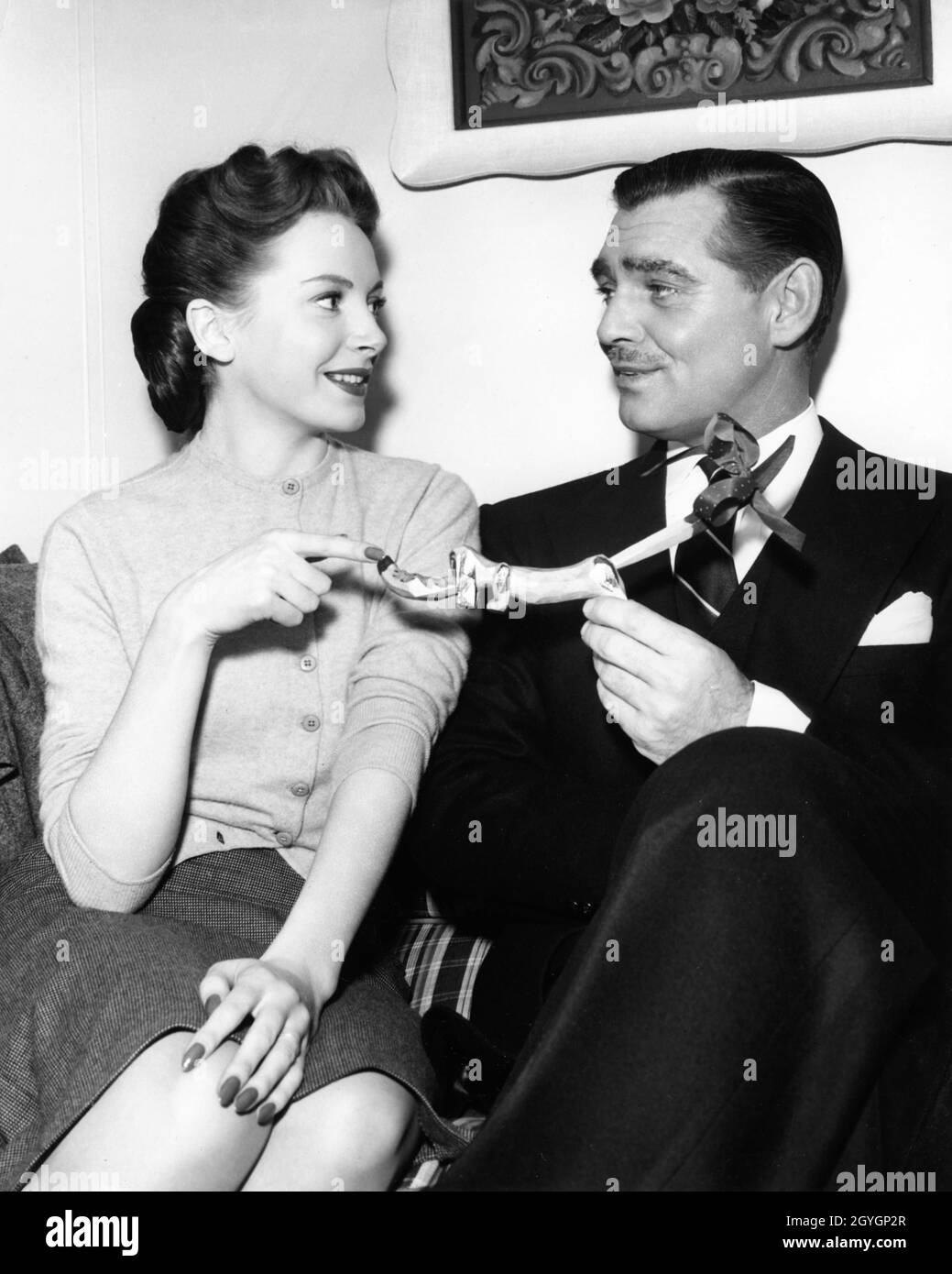 DEBORAH KERR gives CLARK GABLE a wooden dog for his 46th Birthday in ...