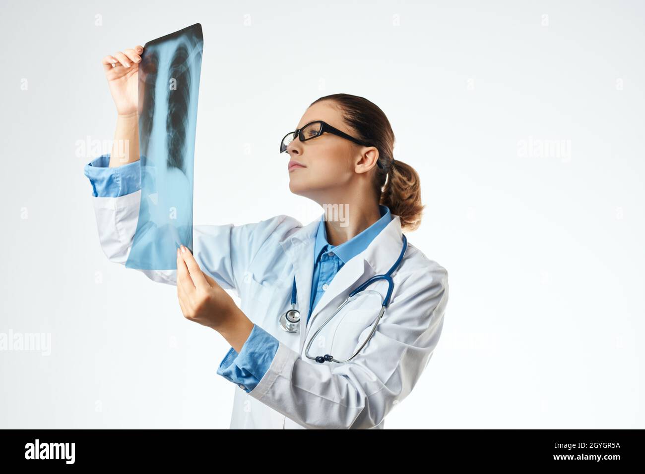 female doctor diagnostics patient scan Studio Stock Photo - Alamy