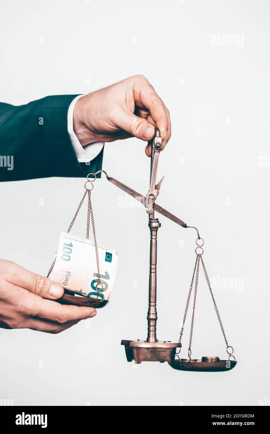 Business man holding balance scale with money. Money management, time ...