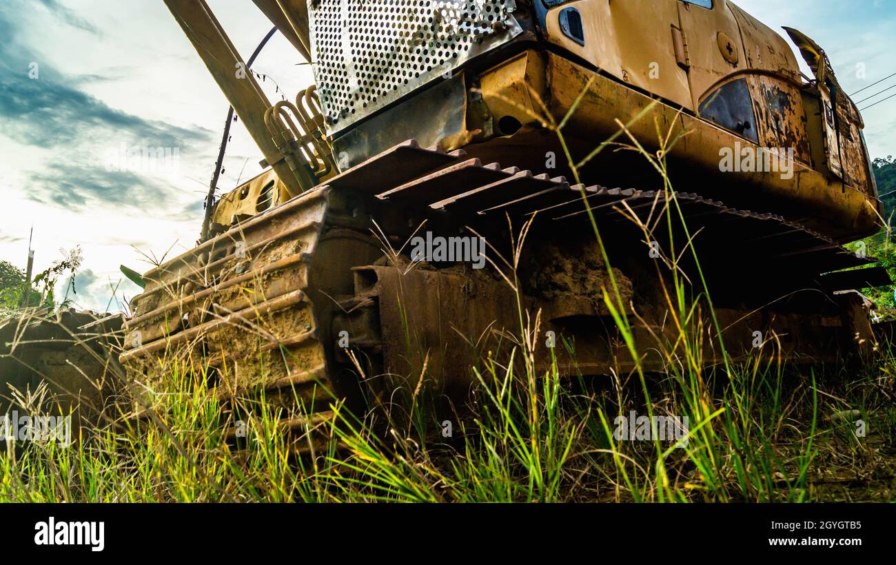 Old rusty excavator wreck in the junkyard Stock Photo - Alamy