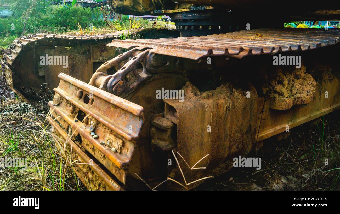 Old rusty excavator wreck in the junkyard Stock Photo - Alamy