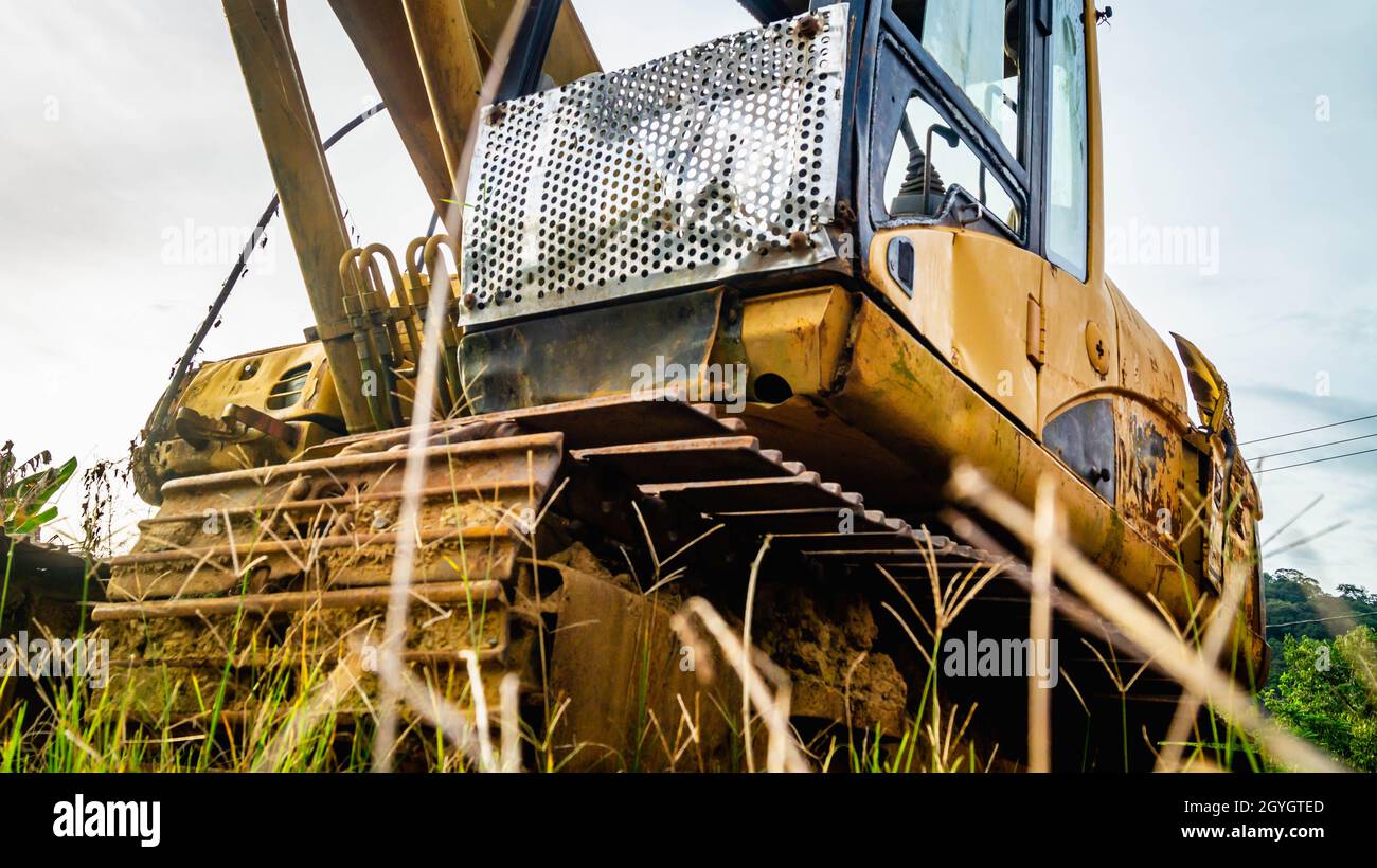Old rusty excavator wreck in the junkyard Stock Photo - Alamy