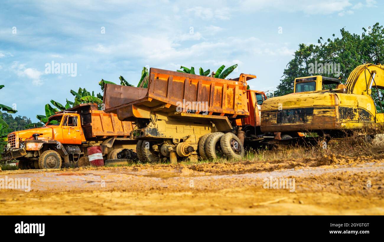 Wreck of heavy machinery in the junkyard of forestry company. Broken ...