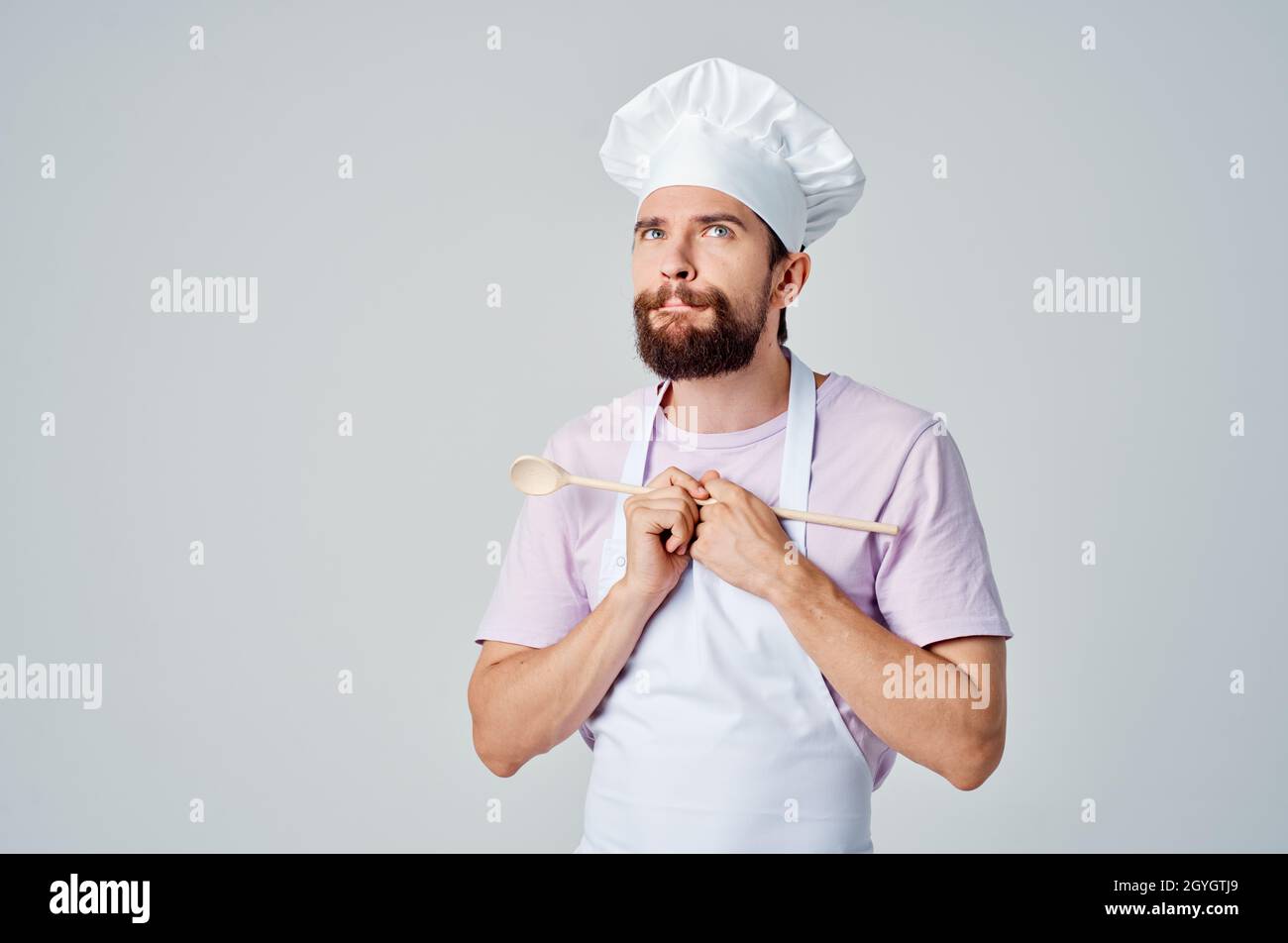 a man in a chef's uniform with a spoon in his hands cooking emotions ...