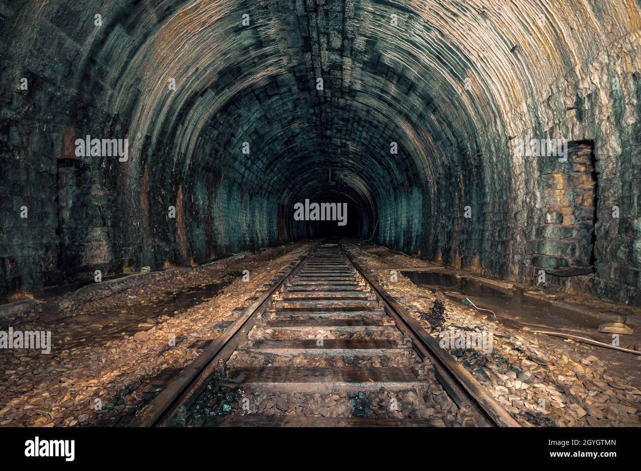 Creepy old abandoned railway tunnel, decayed for decades, a lost place ...
