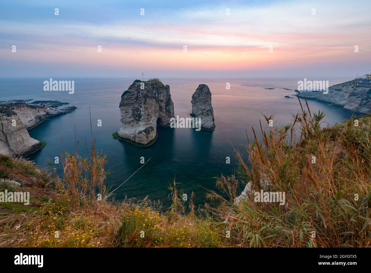 LEBANON, BEIRUT, RAS BEIRUT, PIGEON ROCK (RAOUCHE) AT DUSK Stock Photo ...