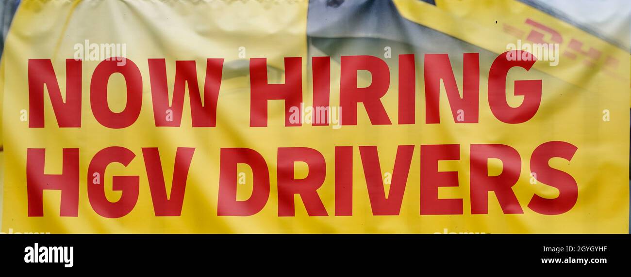 A advert for HGV drivers is displayed at a DHL building in Reading ...
