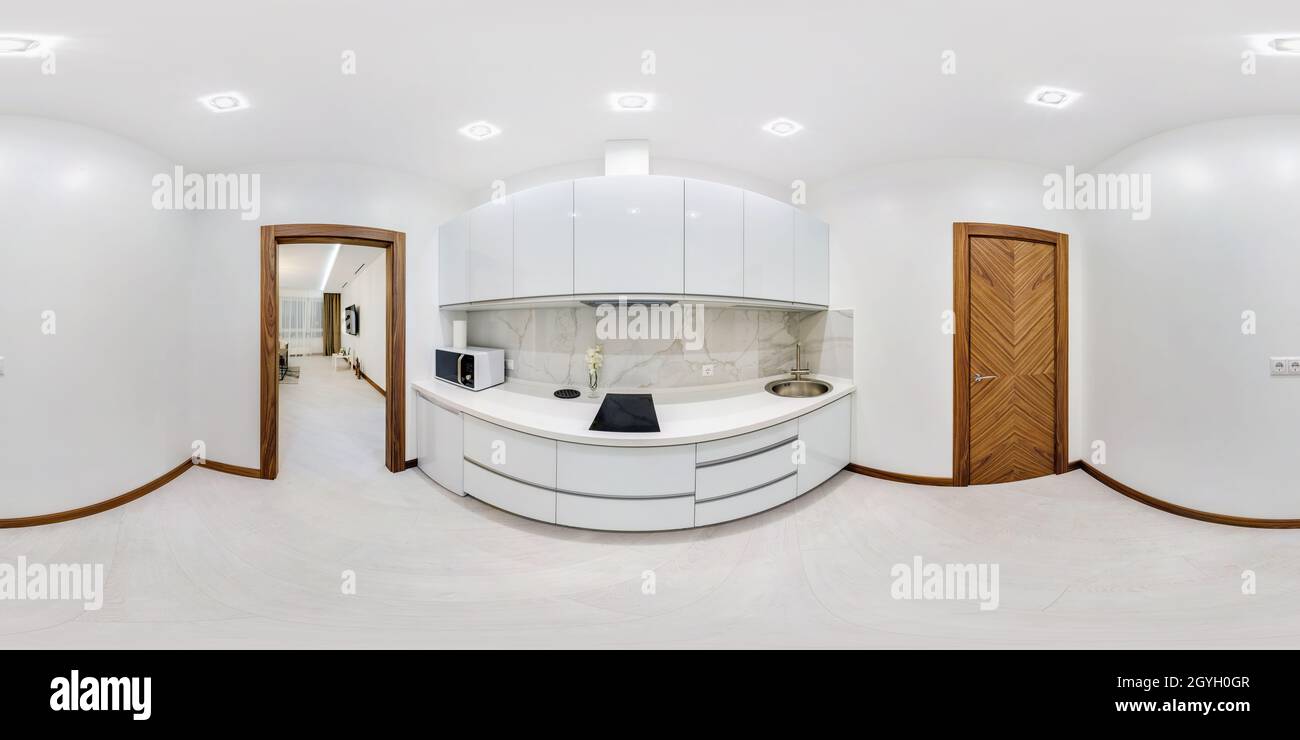 360 hdri panorama in interior of small kitchen in modern white flat ...